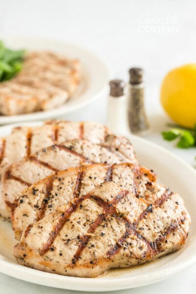 Grilled Pork Chops in Lemon Herb Marinade - Amanda's Cookin' - Pork