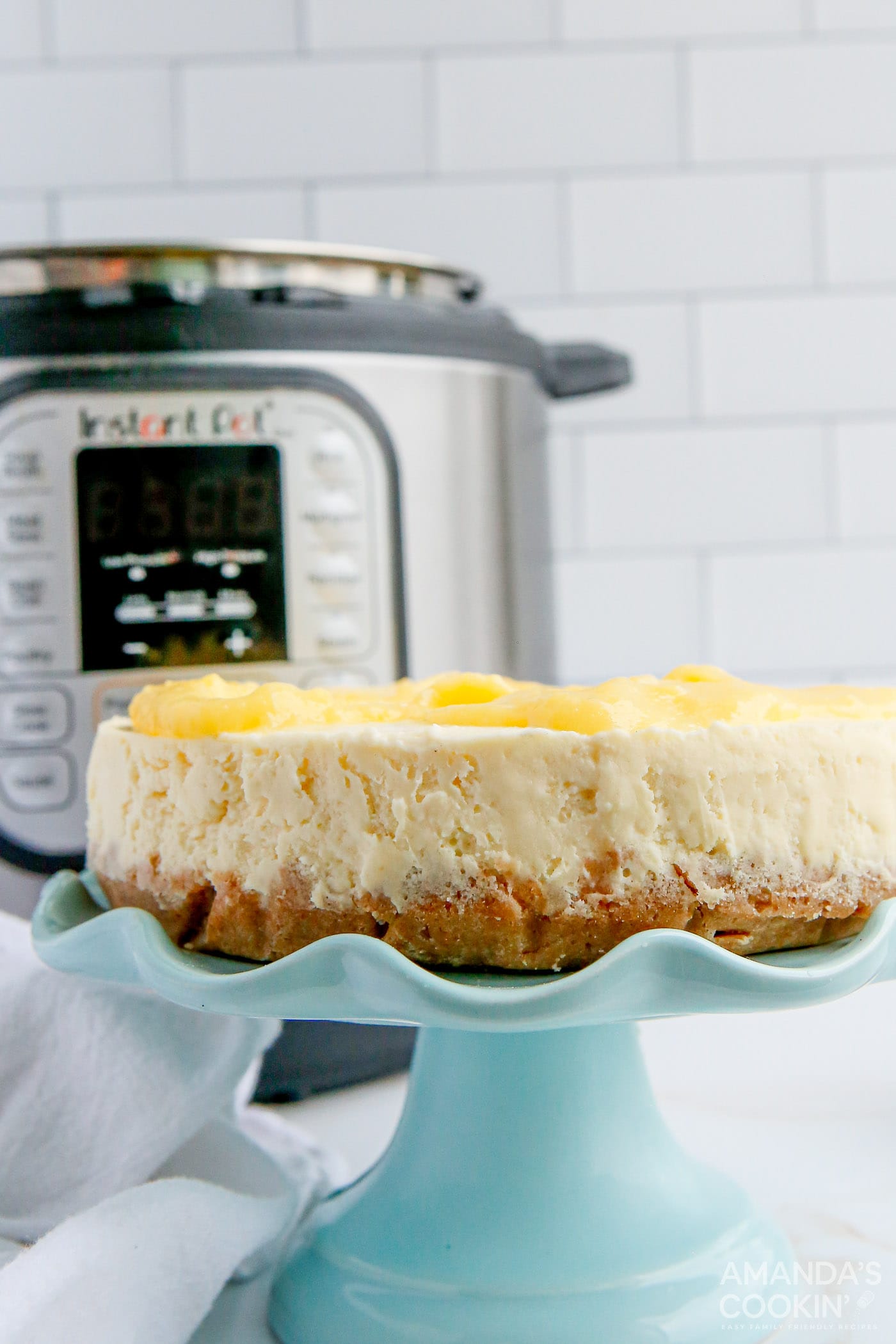 Instant Pot Lemon Curd Cheesecake - Amanda's Cookin' - Cheesecakes