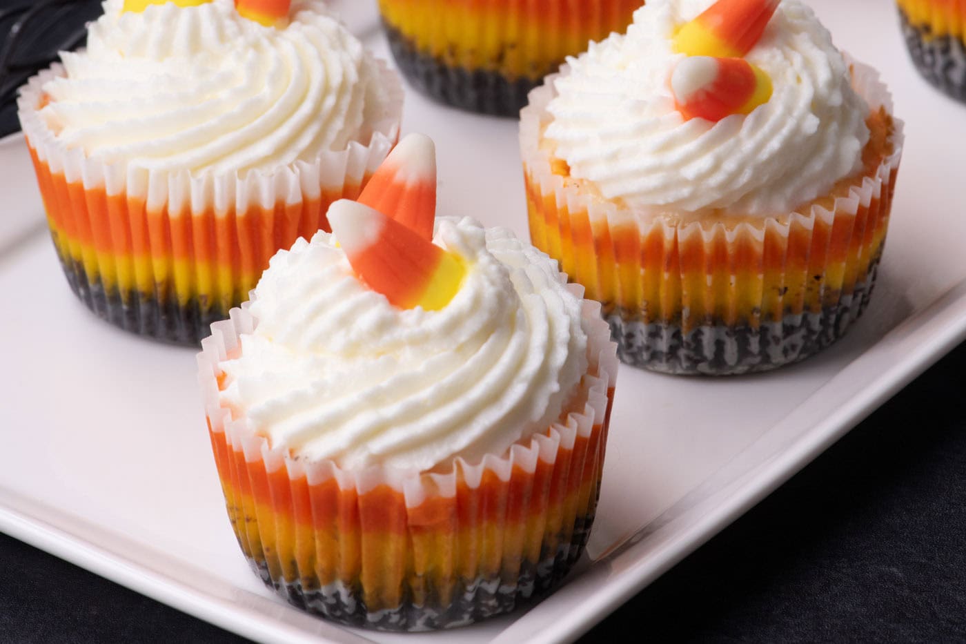 Mini Candy Corn Cheesecakes - Amanda's Cookin' - Halloween