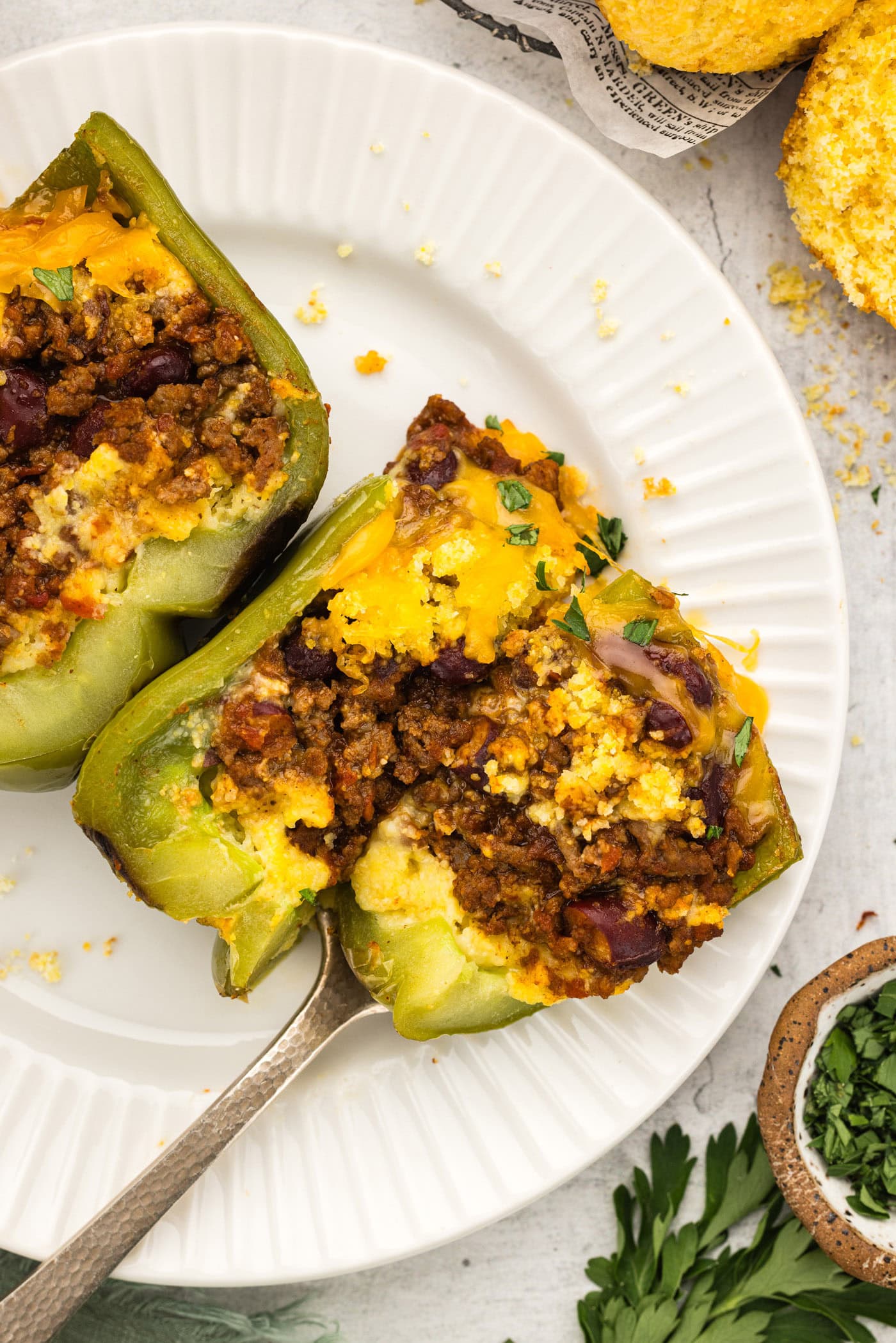 Chili and Cornbread Stuffed Peppers - Amanda's Cookin' - Ground Beef