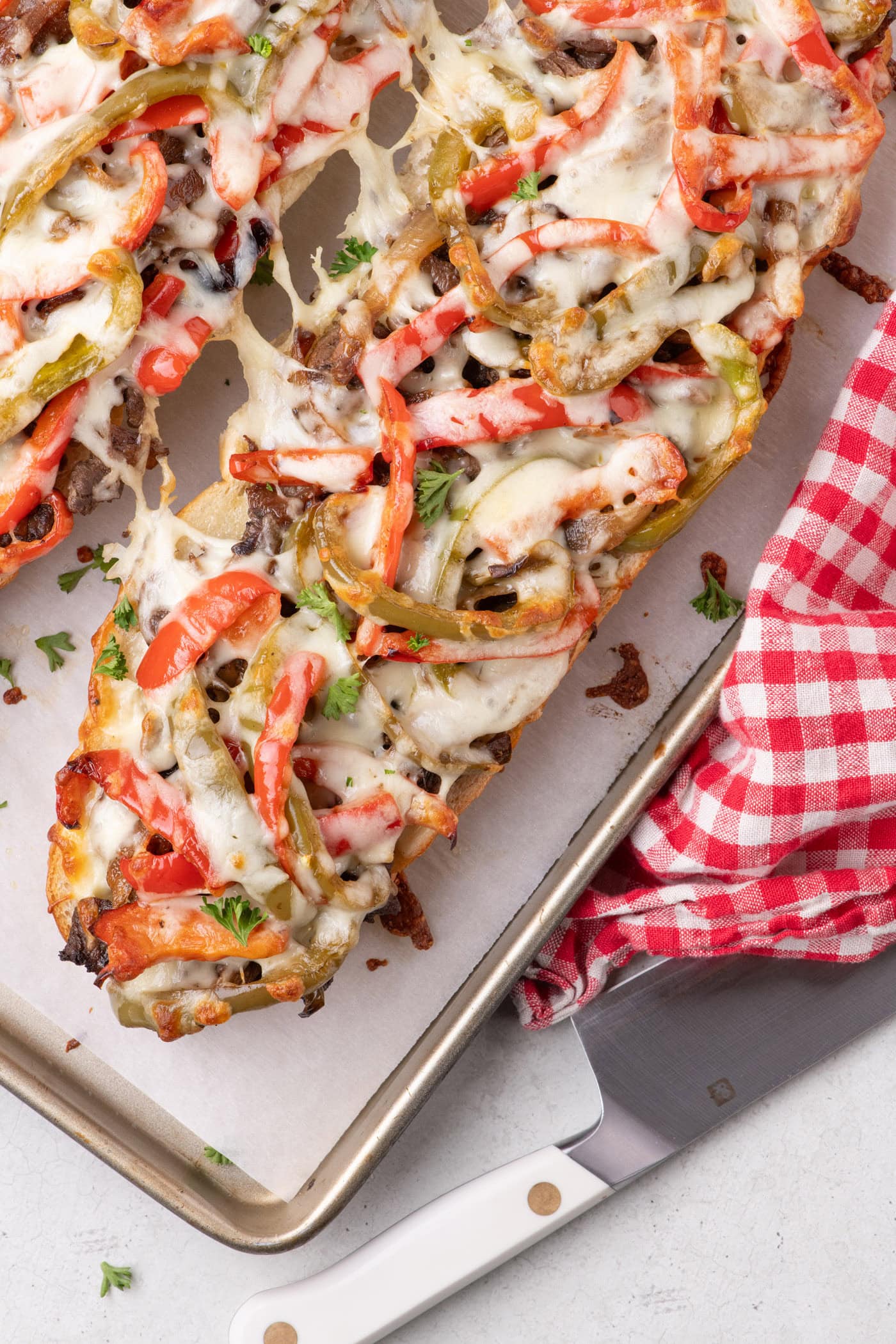 Philly Cheesesteak Cheesy Bread - Amanda's Cookin' - Beef