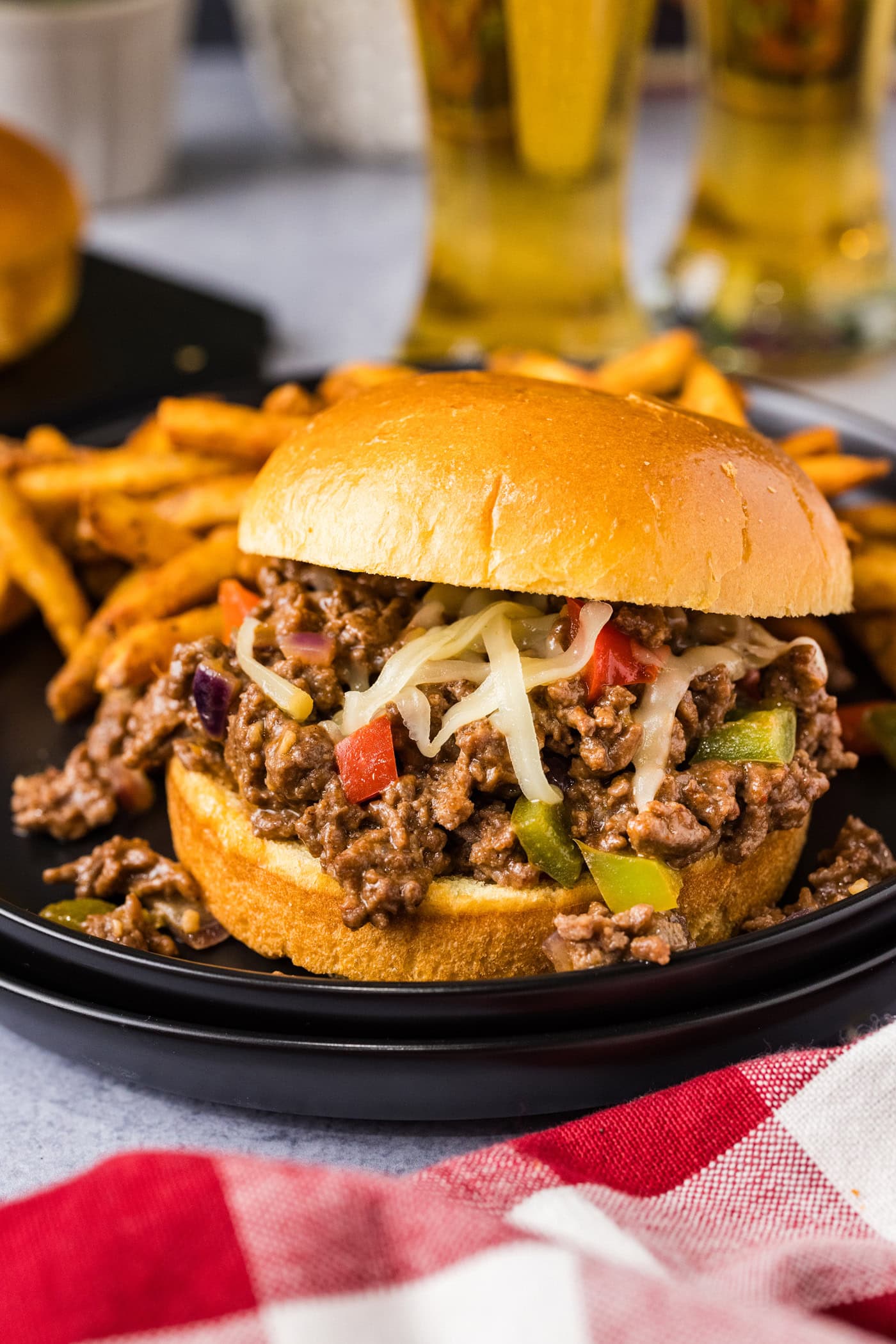 Philly Cheesesteak Sloppy Joes - Amanda's Cookin' - Ground Beef